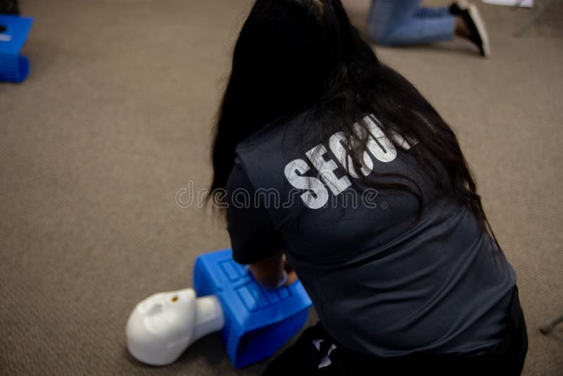Security Worker during First Aid Training Stock Photo - Image of ...