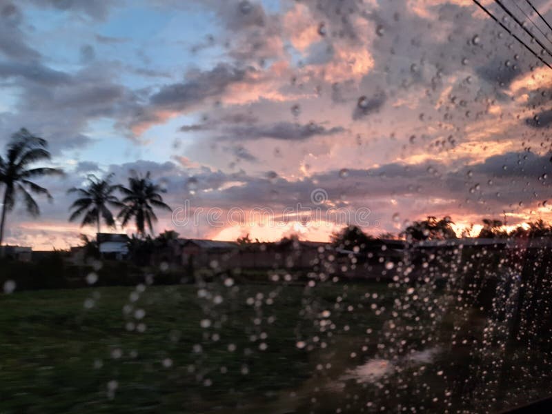 Sunsets in the rain stock image. Image of sunsets, raining - 210432385