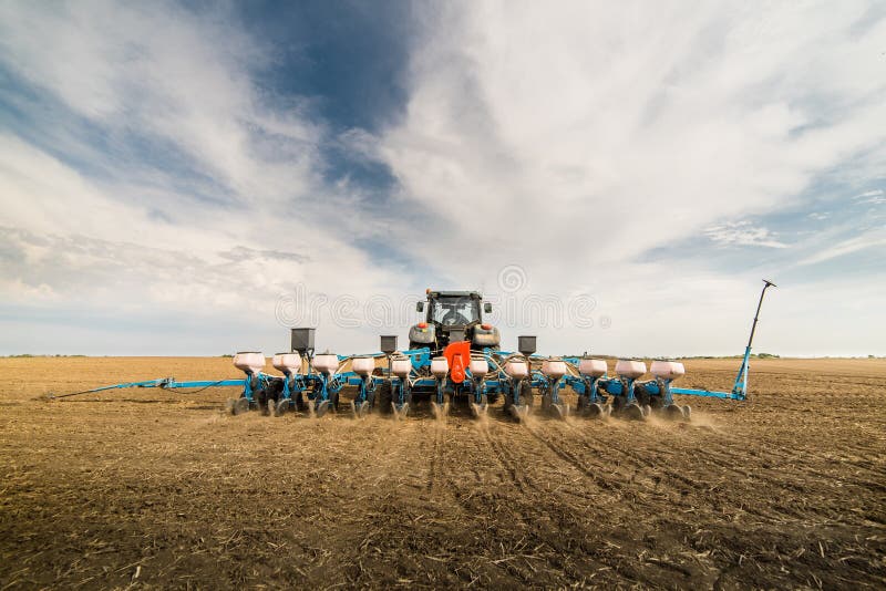 Seeding crops at field stock photo. Image of equipment - 89952704