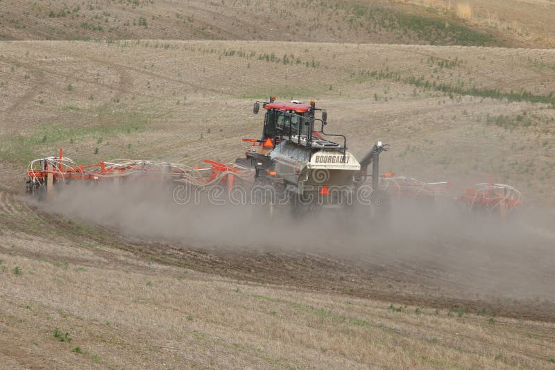 Seeding in Saskatchewan editorial image. Image of canola - 150152505