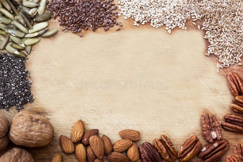 Seeds on a wooden table stock photo. Image of board, wooden - 55447156