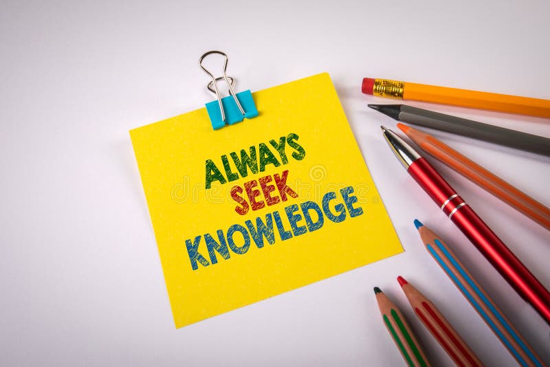 Always Seek Knowledge. Colorful Stationery on the Office Table Stock ...