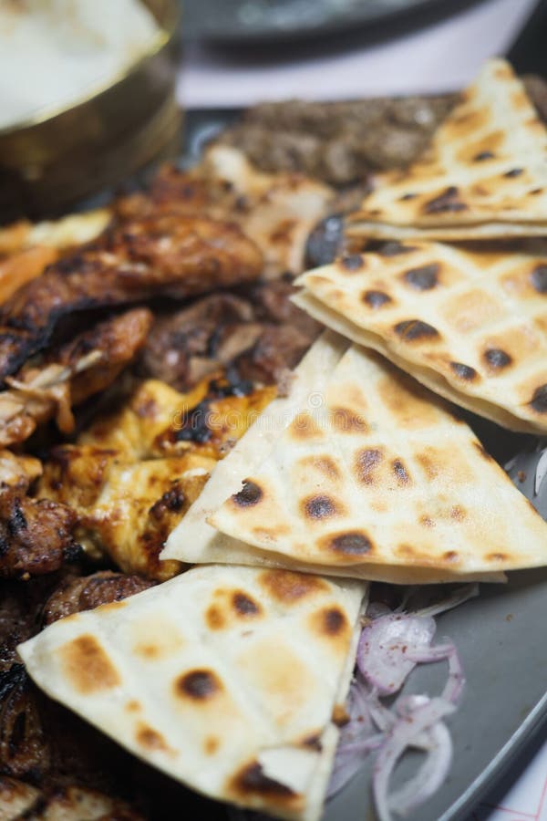 Seekh Kabab, Naan Bread, and Sauce on a Plate Stock Photo - Image of ...