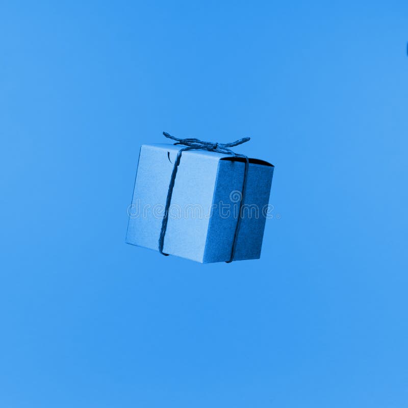 Seemless Pattern of Craft Cardboard Gift Boxes on the Solid Blue ...