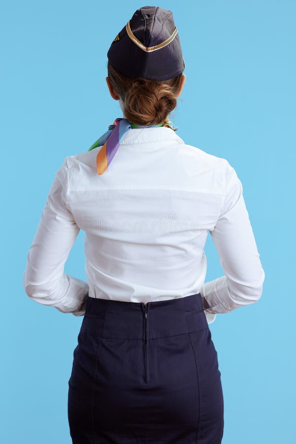 Seen from Behind Modern Female Stewardess on Blue Stock Image - Image ...