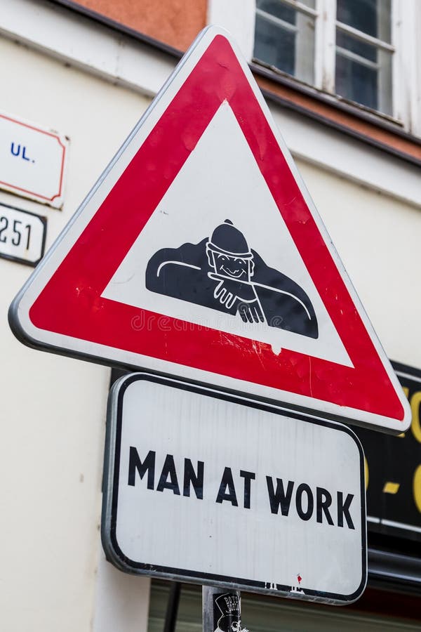 Man at work sign editorial photography. Image of peaking - 178267392
