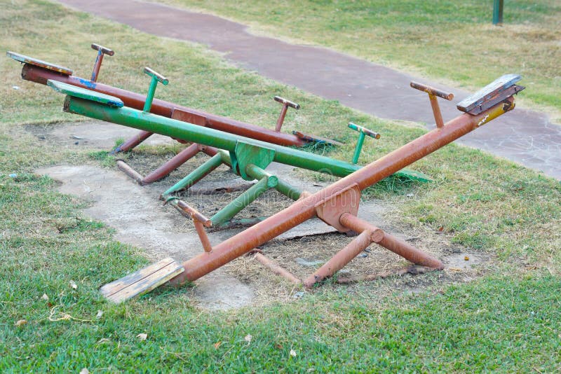 Old Seesaw in Outdoor Playground for Kids Stock Photo - Image of park ...