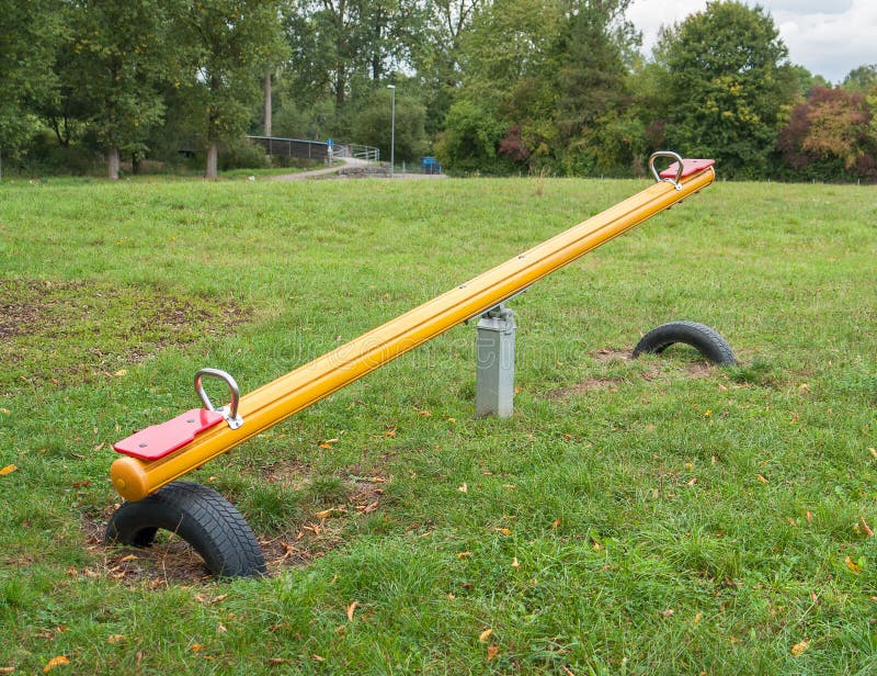 Seesaw stock photo. Image of playing, teeter, area, metal - 60572924