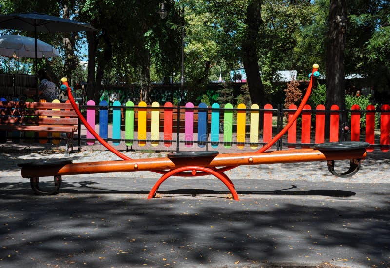 Empty Seesaw on Playground in Public Park. Wooden Seesaw in the Park ...