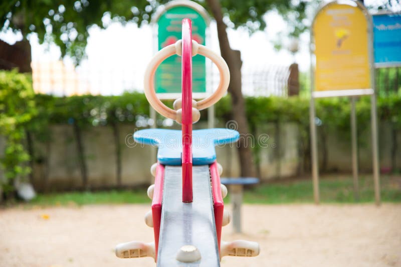 Seesaw at playground park stock image. Image of play - 56848221