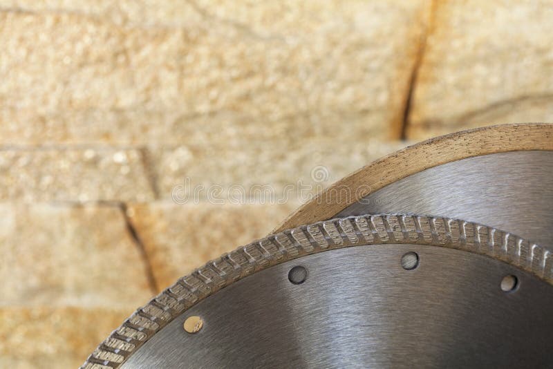 Segment of a Diamond Cutting Disc on a Background of Orange-golden ...