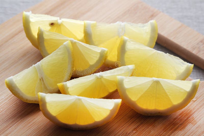 Segments of Lemon in Counter Light Stock Image - Image of pieces ...