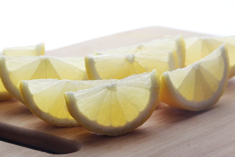 Segments of Lemon in Counter Light Stock Image - Image of pieces ...