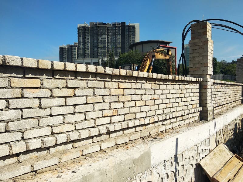 Brick Installation Works at Construction Sites. Stock Photo - Image of ...