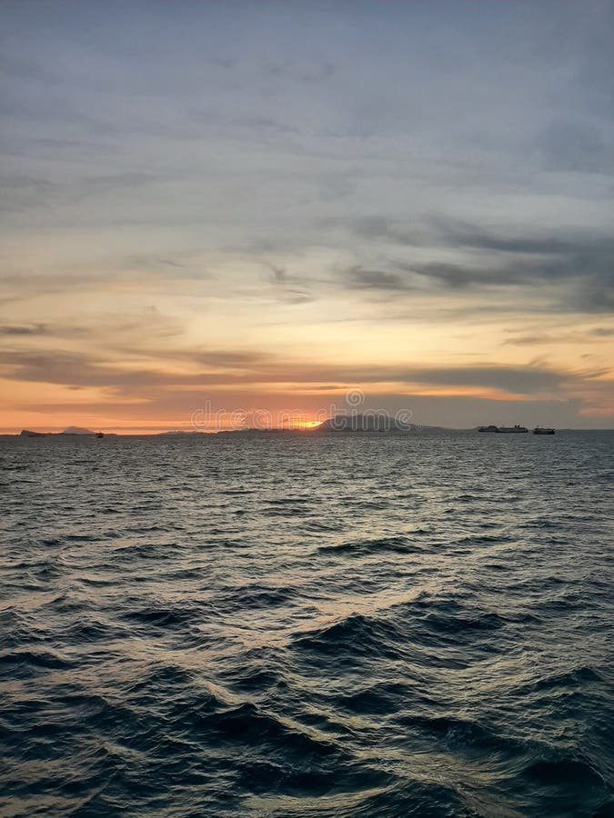 Selat sunda sunset stock photo. Image of selat, darkness - 265897870