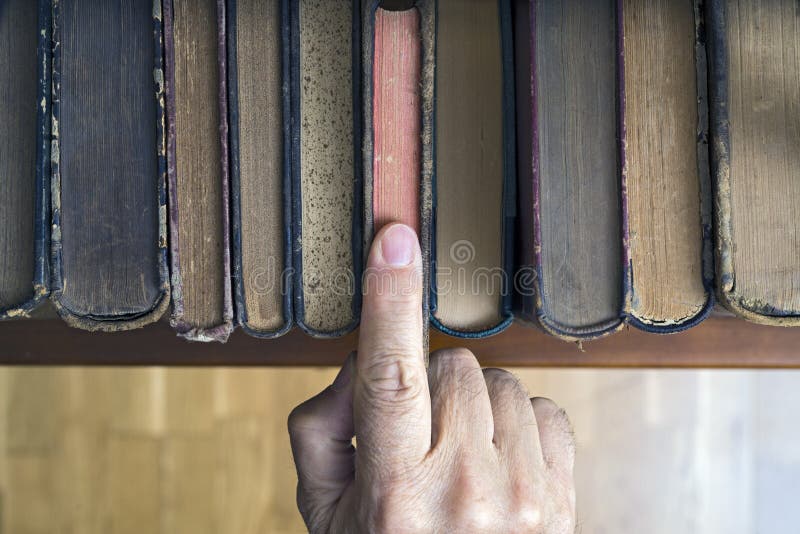 Selecting a book stock photo. Image of literature, choice - 43820694