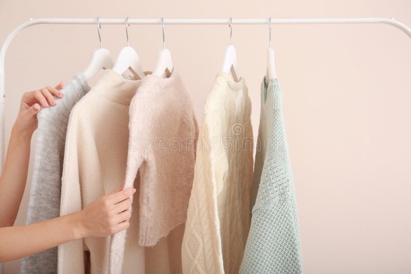 Woman Choosing Clothes Hanging on Rack Stock Image - Image of fabric ...