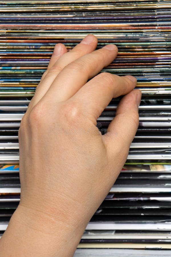 Selecting a magazine stock image. Image of edges, monthly - 12512027