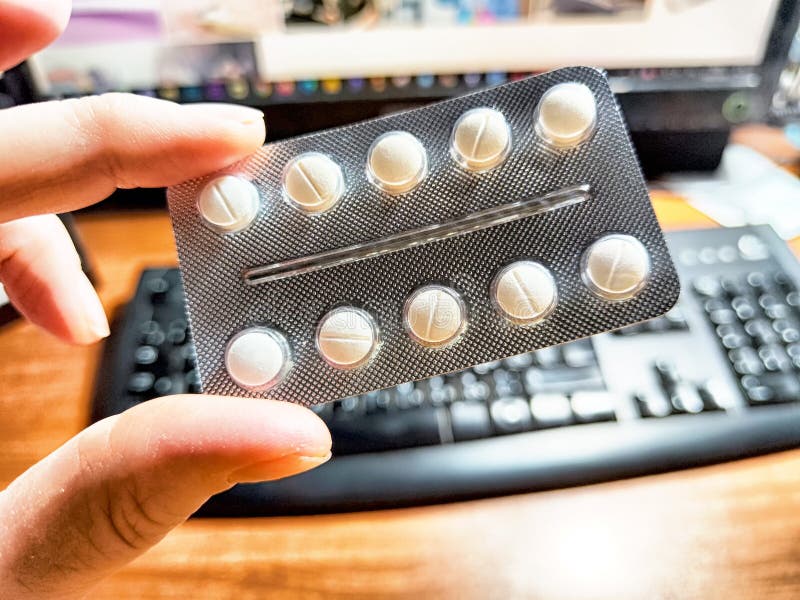 Selecting Medication Online while Holding a Blister Pack in a Home ...