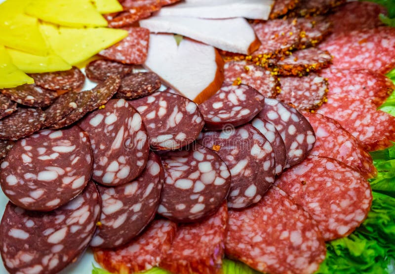 Selection of Assorted Meats and Cheeses Displayed on a Platter at a ...