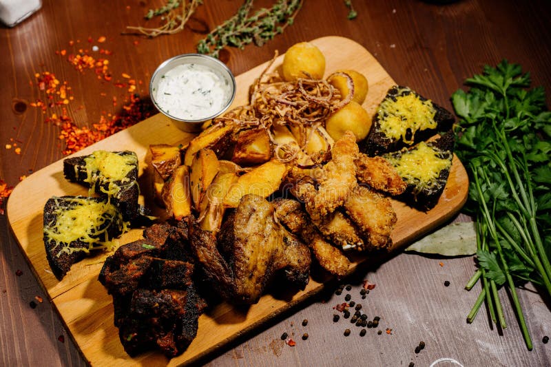 Selection of Beer and Snacks.Chips, Fish, Beer Sausages on the Table ...