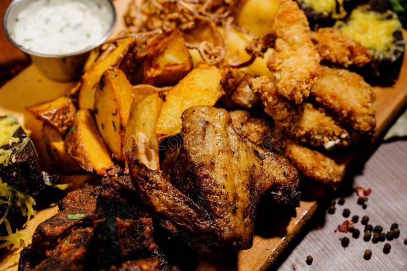 Selection of Beer and Snacks.Chips, Fish, Beer Sausages on the Table ...
