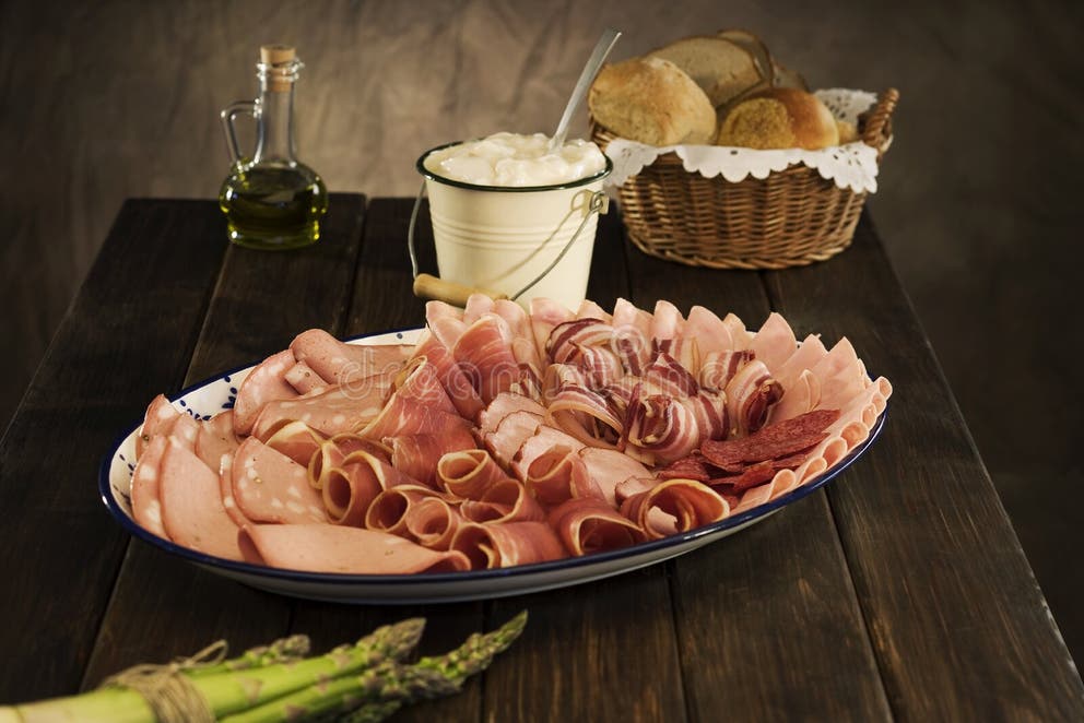 Selection of Cured Meat in a Rustic Setting Stock Image - Image of ...