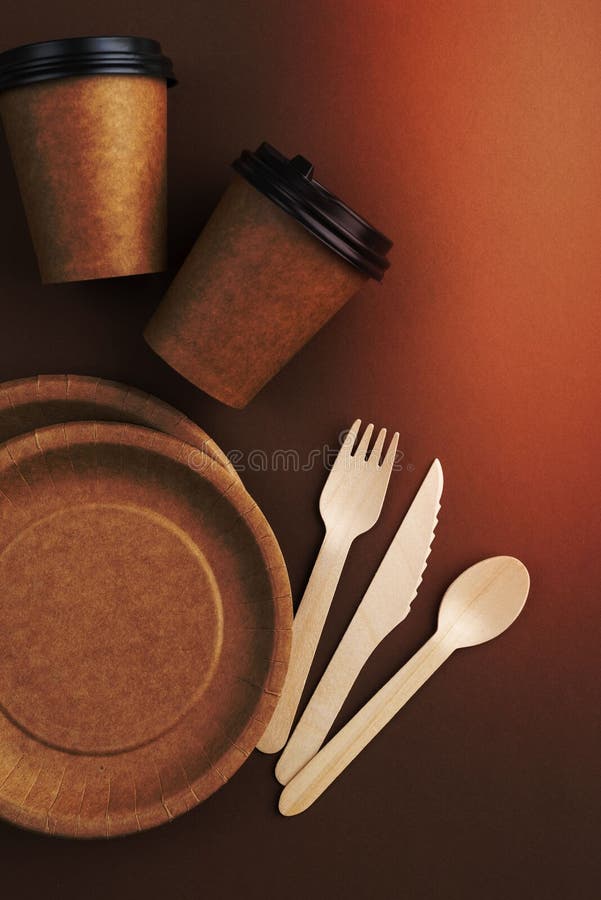 A Group of Forks, a Bowl and Paper Cup Next To Each Other Stock Photo ...