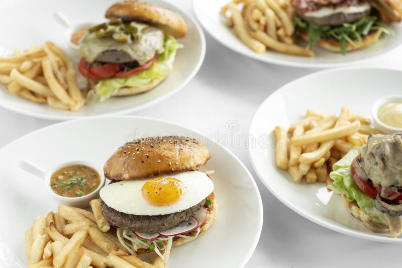 Selection of Many Different Burgers on Restaurant Table Stock Image ...