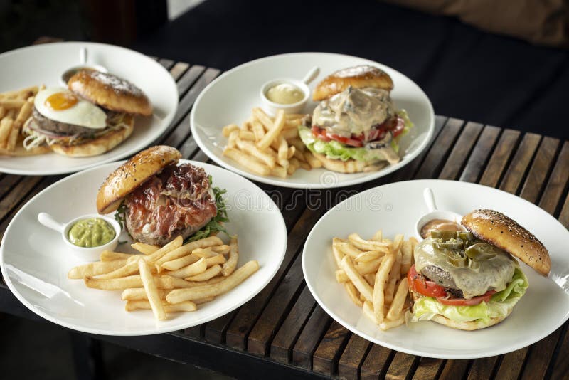 Selection of Many Different Burgers on Restaurant Table Stock Photo ...