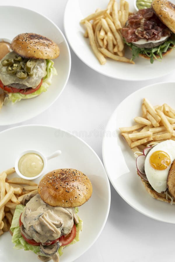 Selection of Many Different Burgers on Restaurant Table Stock Photo ...