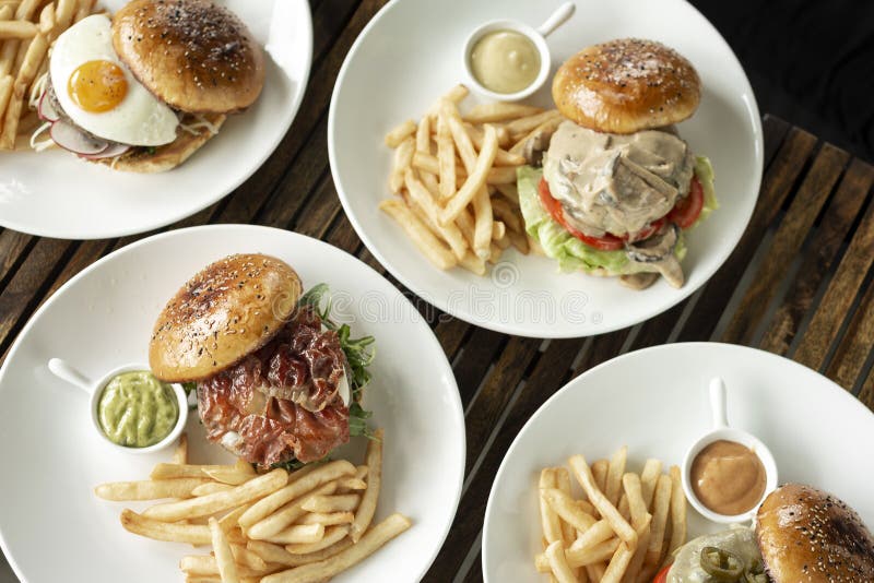 Selection of Many Different Burgers on Restaurant Table Stock Photo ...