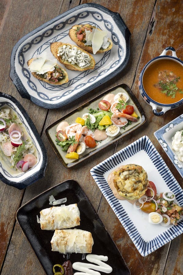 Selection of Many Different Tapas on Rustic Wood Table Stock Image ...