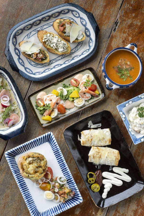 Selection of Many Different Tapas on Rustic Wood Table Stock Image ...