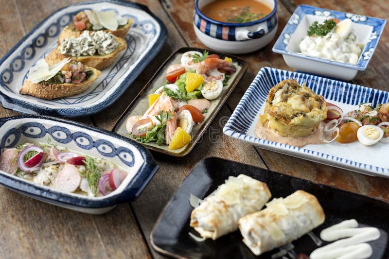 Selection of Many Different Tapas on Rustic Wood Table Stock Image ...