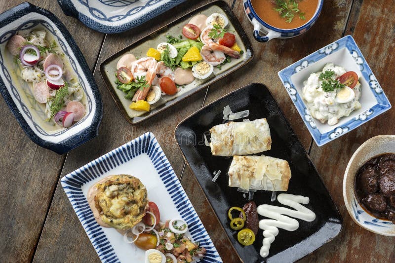 Selection of Many Different Tapas on Rustic Wood Table Stock Photo ...