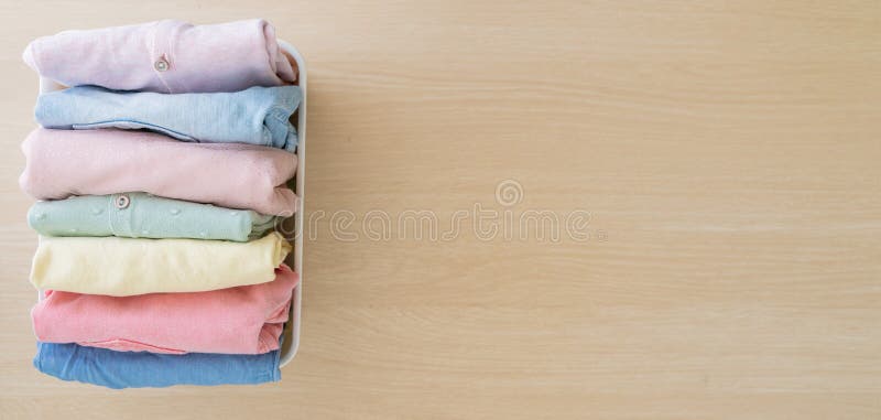 Selection of Neatly Folded Fresh Clothes for Vertical Storage Stock ...