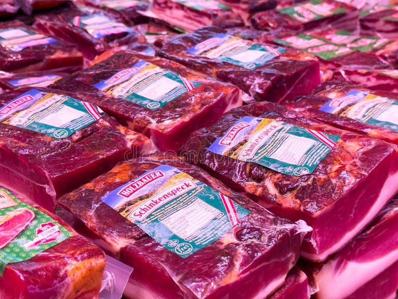 Selection of Packaged Smoked Bacon in Supermarket Display Section ...