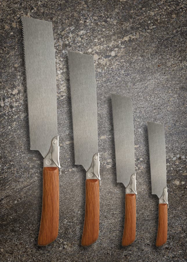 A Selection of Precision Carpentry Hand Saws on a Stone Backdrop Stock ...