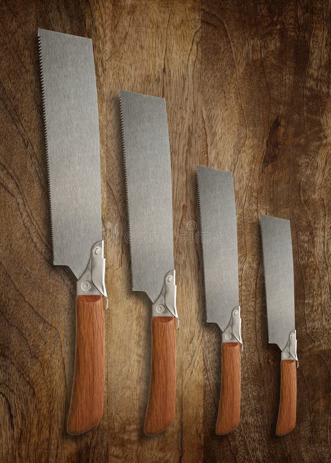 A Selection of Precision Carpentry Hand Saws on a Wooden Backdrop Stock ...