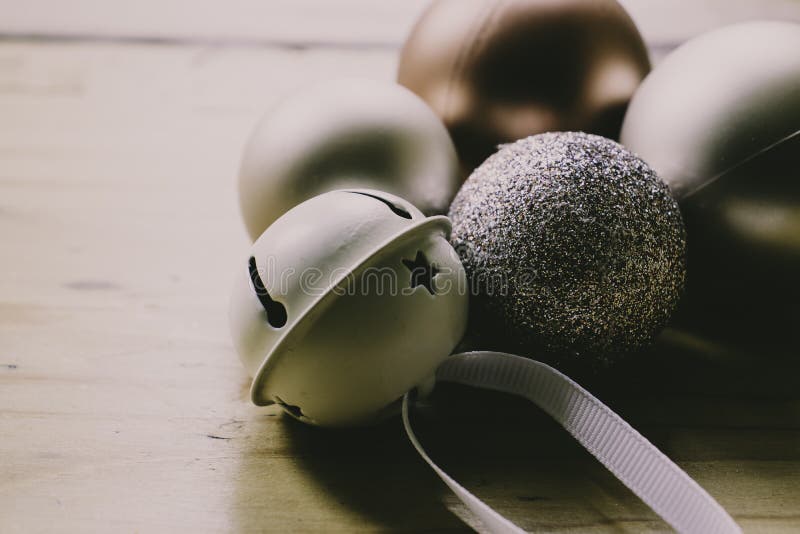 A Selection of Rose Gold Baubles and a White Jingle Bell Stock Image ...