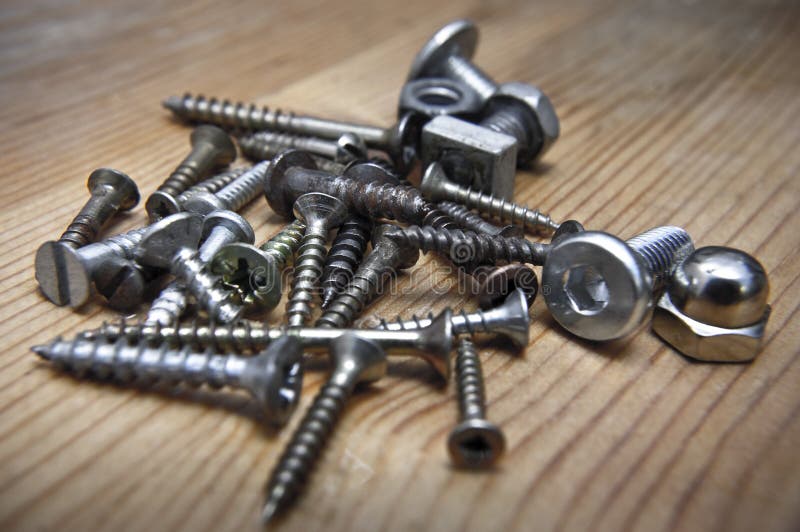 Selection of Screws on Table Stock Photo - Image of screws, hardware ...