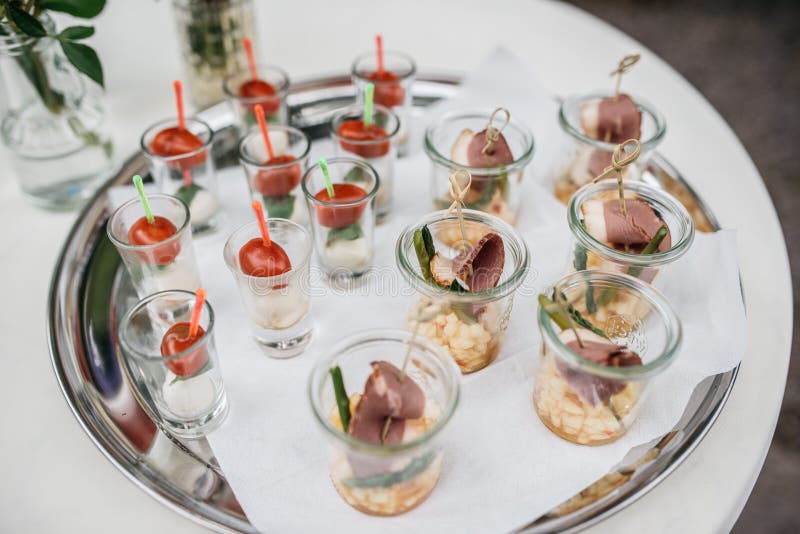 Many Small Dishes are Placed on a Platter for the Guests To Take Stock ...