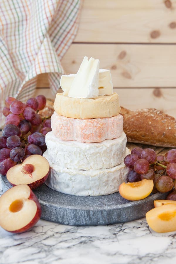 Selection of soft cheeses stock image. Image of marble - 71032249