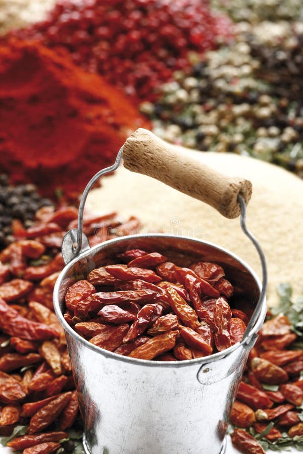 A Selection of Spices, Dried Chilis in Zinc Bucket in Foreground Stock ...