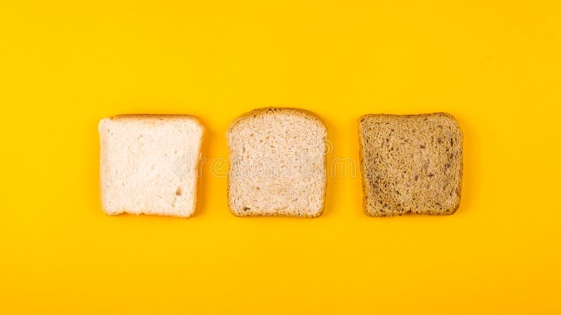 A Selection of Toast Bread for Breakfast. Minimalism on Yellow Stock ...