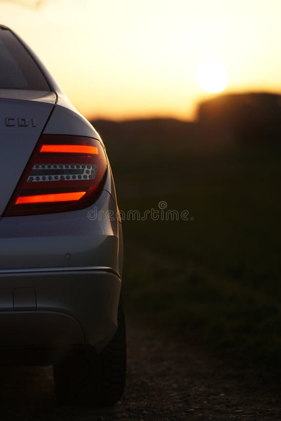 Selective of a Car Backlight on a Sunset Stock Photo - Image of ...