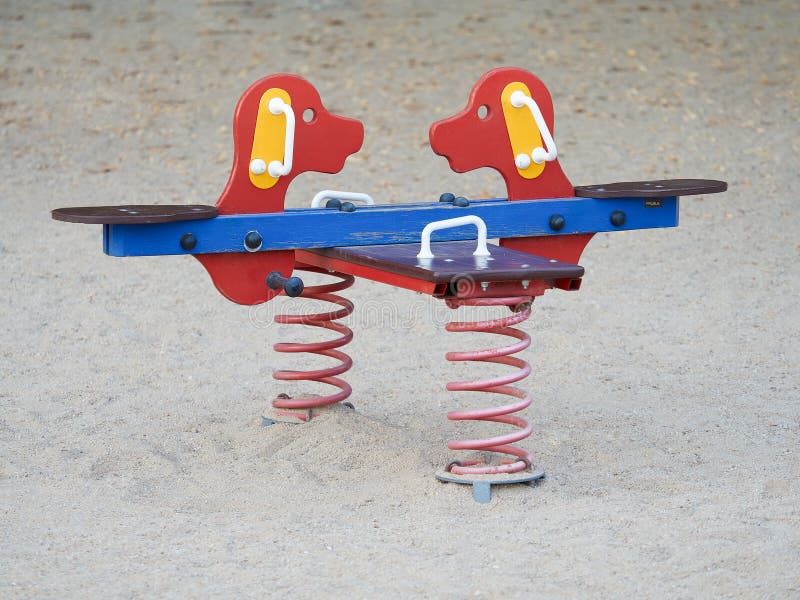 Selective Closeup of Rocking Dogs in a Playground Stock Photo - Image ...