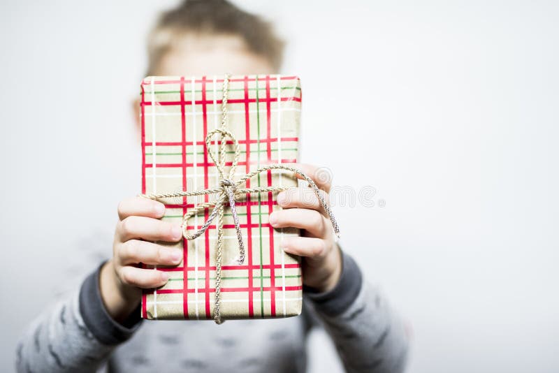 Selective Closeup Shot of a Person Holding a Wrapped Gift Box Stock ...