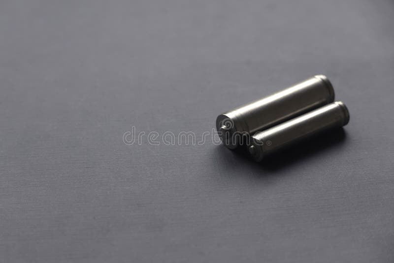Selective Focus of AA and AAA Battery on Grey Background with Copy ...
